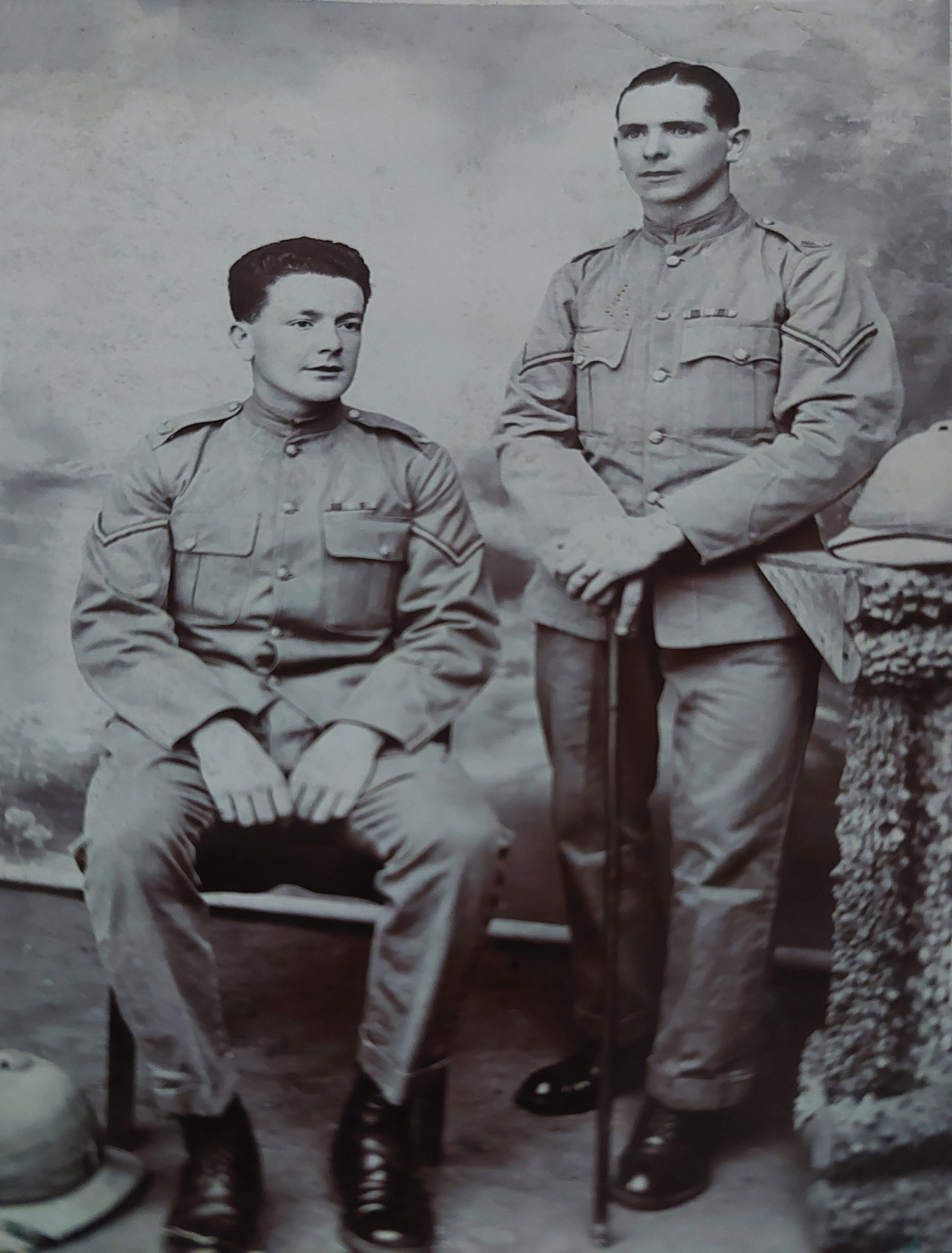 Leigh, Pte Robert seated next to someone named Joe (Photo courtesy of ...